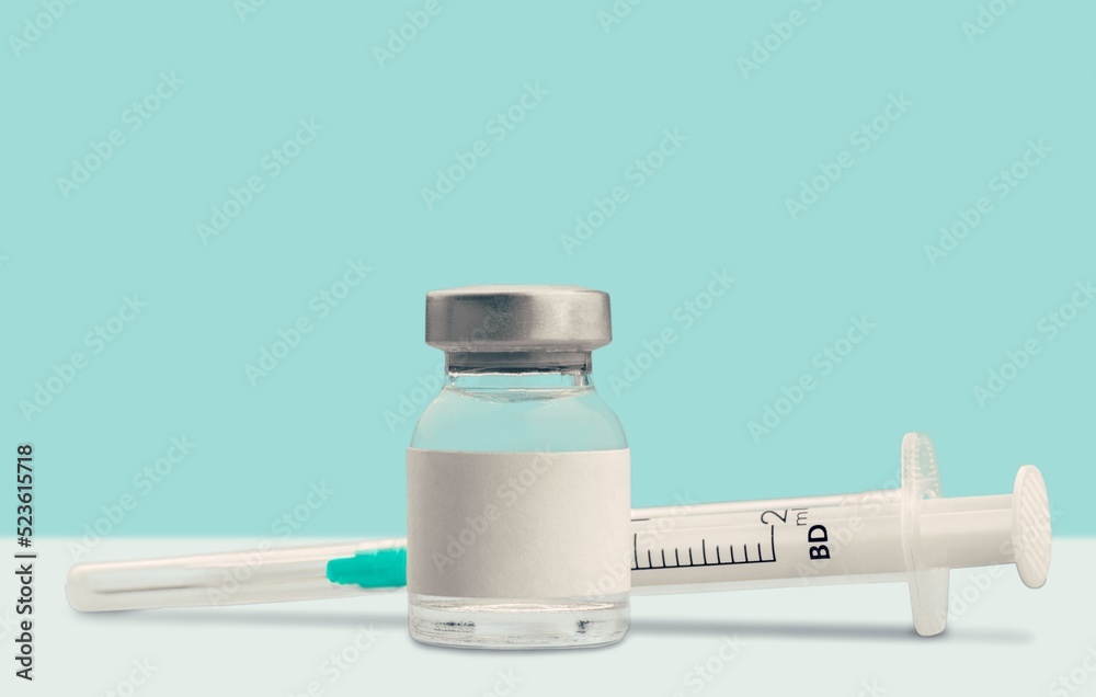 medical liquid for injection in a glass vial on the desk Stock Photo ...