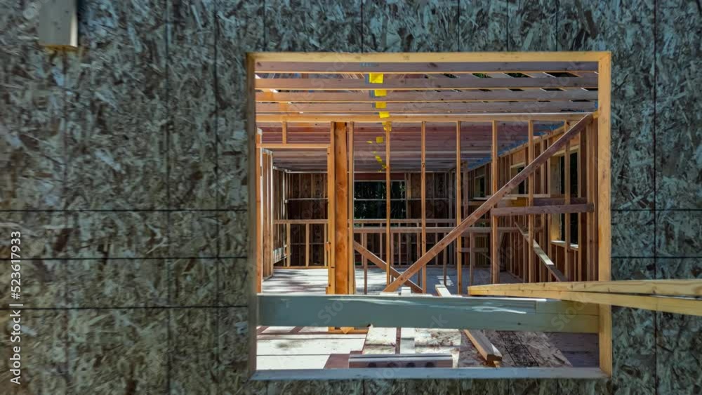 Moving through the interior of a modern home in mid construction phase ...