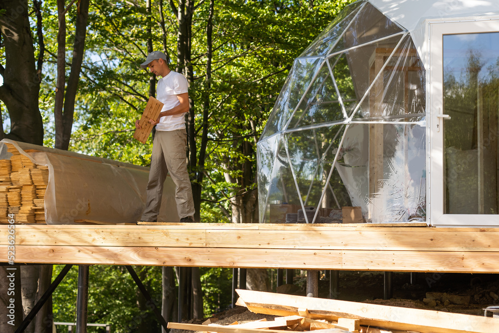 the master builds the dome. Outside spherical glamping dome ...