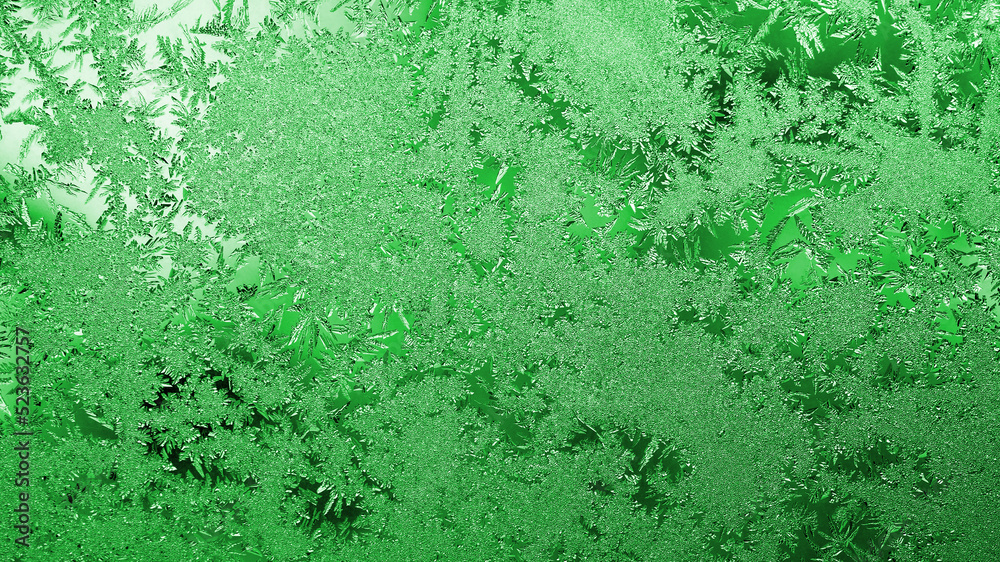 Green winter background or wallpaper. Drawing of ice crystals and frost ...