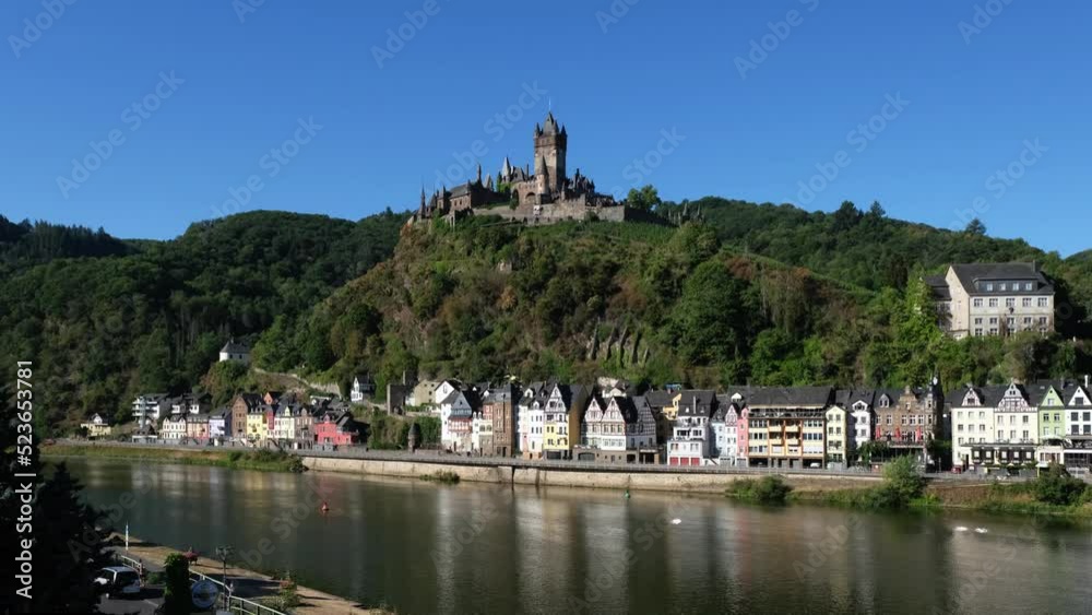 Romantic german medieval hill-top castle and traditional half-timbered ...