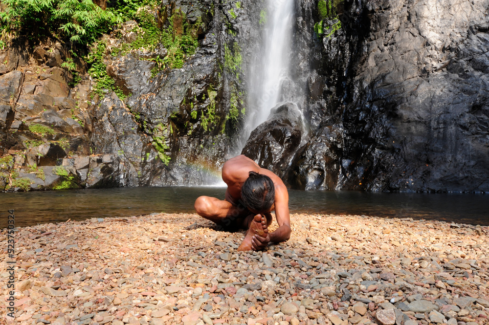 janu sirsasana or head to knee pose in yoga Stock Photo | Adobe Stock