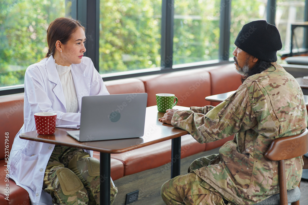 Doctor meet with army soildier in military hospital office interview ...