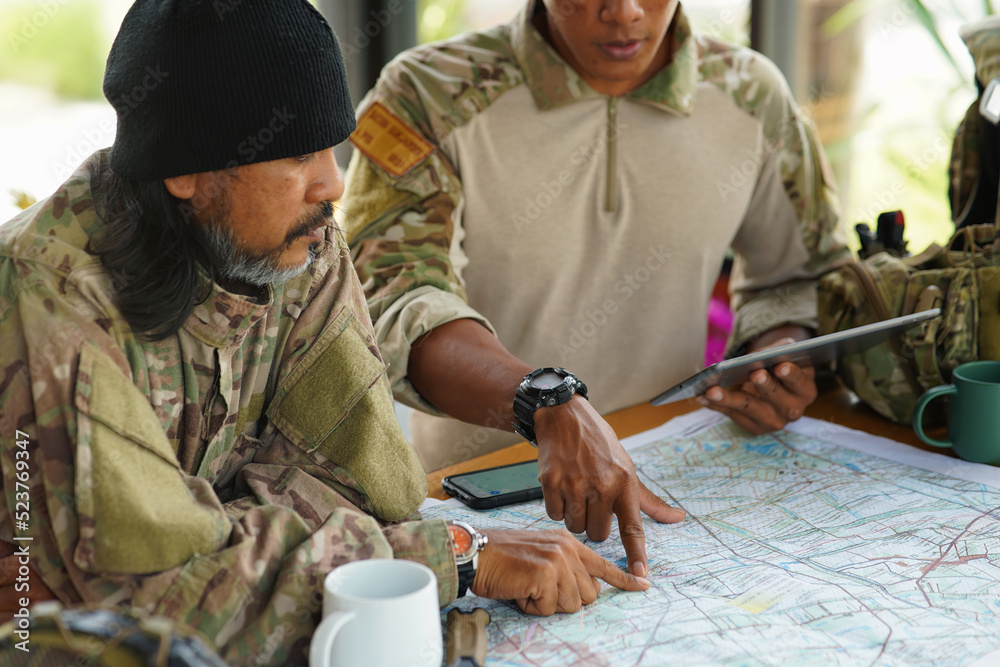 Army ranger military special force hold a cup drink coffee discussion ...