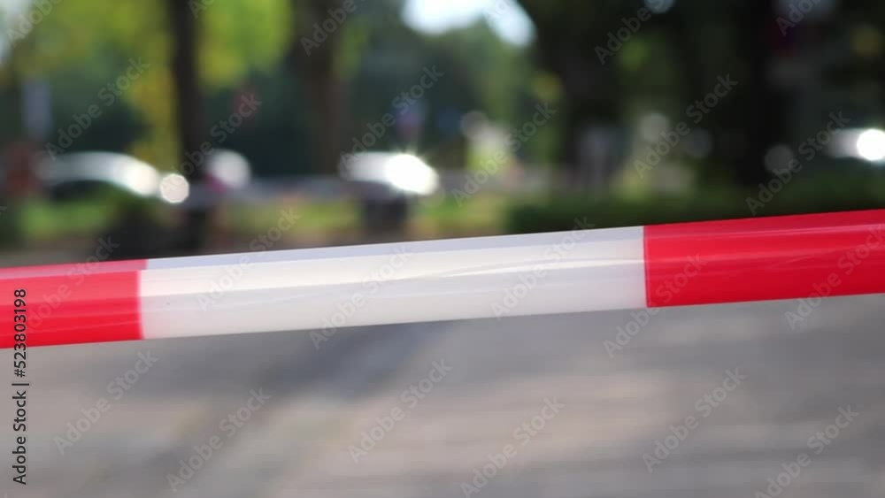 Red white barrier tape in pandemic lockdown marks crime scene ...
