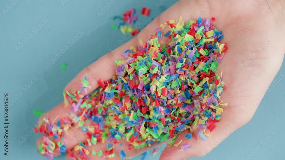 Microplastic pollution, plastic particles in hand close-up, garbage and ...