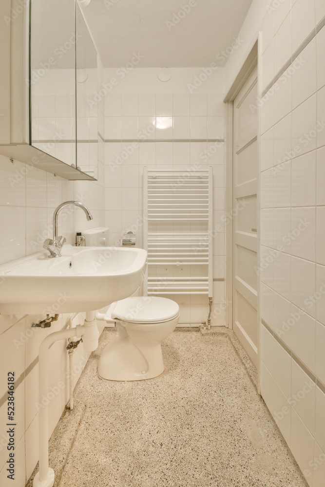 Glass partition between shower tap and wall hung toilet in modern ...