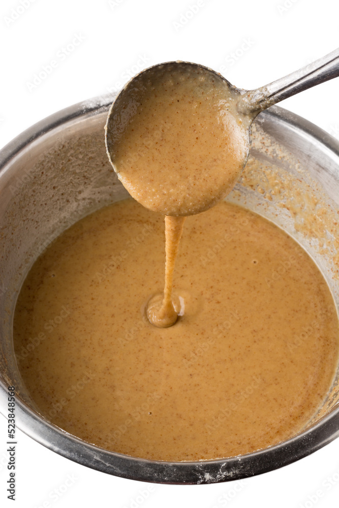 kevum or kavum, deep fried southeast asian sweet mix in a bowl with a ...