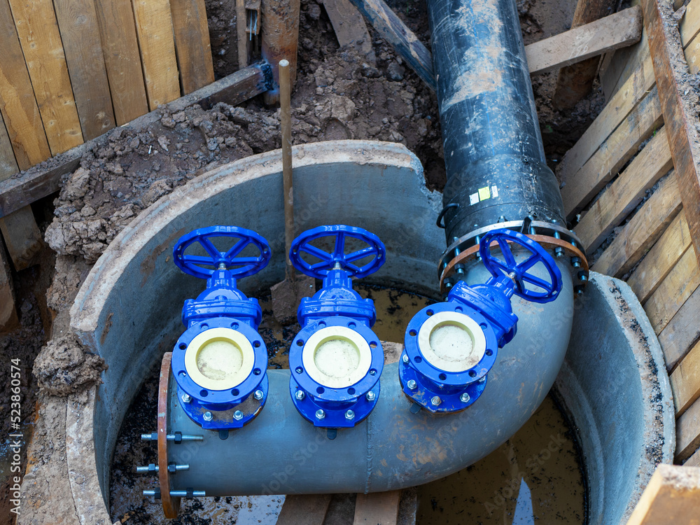 Plumbing repair. Installation of new gate valves. City construction of ...