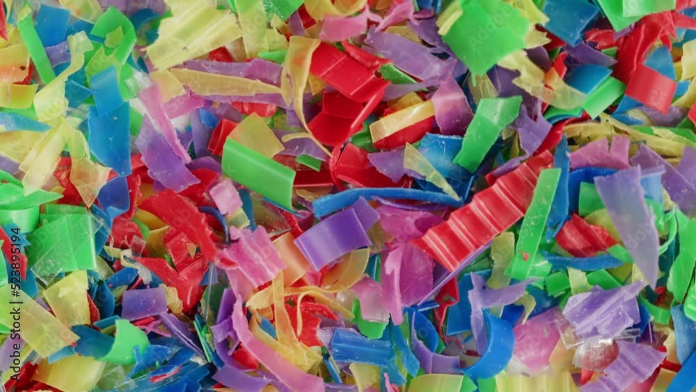 Microplastic pollution, plastic particles top view rotating, garbage ...