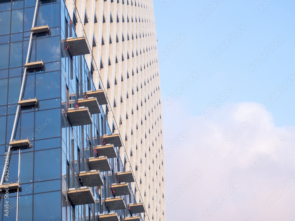 Part of a high-rise building under construction. End of construction ...