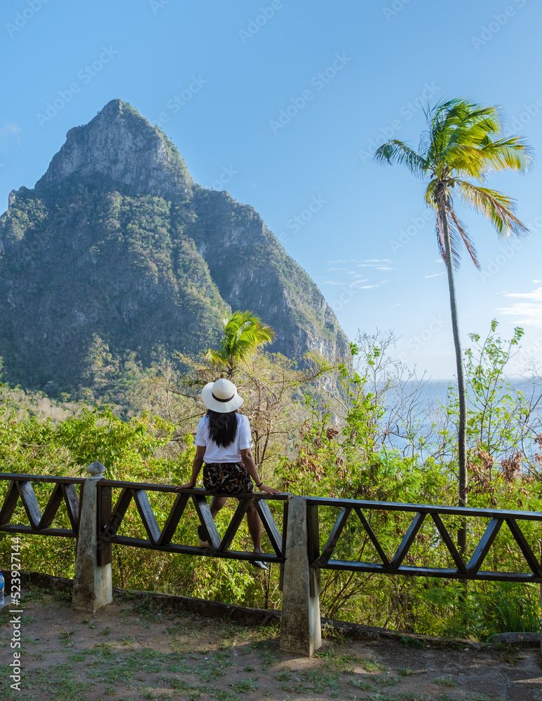 Asian women with a hat and a view at the Pitons of St Lucia Saint Lucia ...