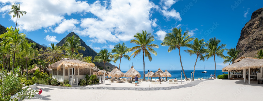 Sugar beach Saint Lucia, is a public white tropical beach with palm ...