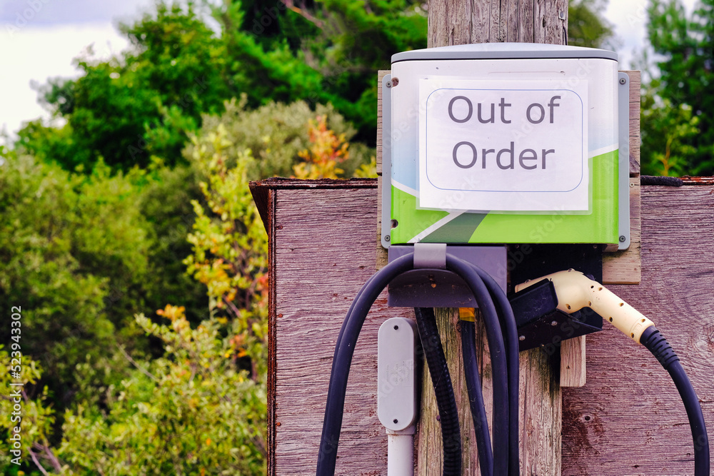 Out of order sign on an EV car or electric vehicle charging station ...