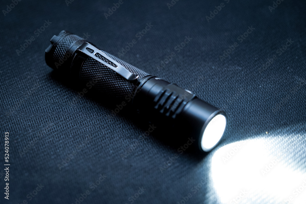 flashlight on black background Stock Photo | Adobe Stock
