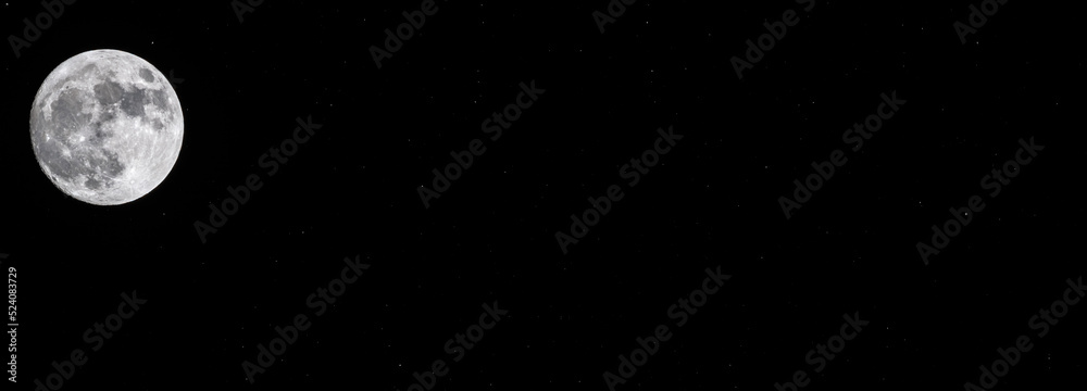 moon against black background with white stars, large panoramic view in ...
