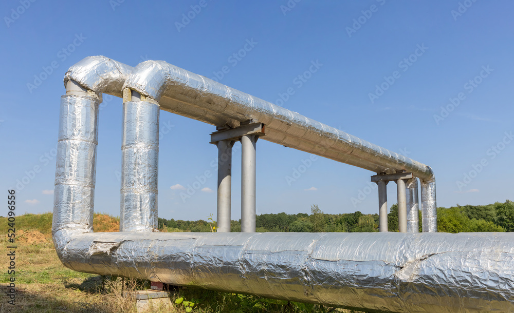 Old damaged pipes and aluminum insulation of the Central Steam Pipeline ...