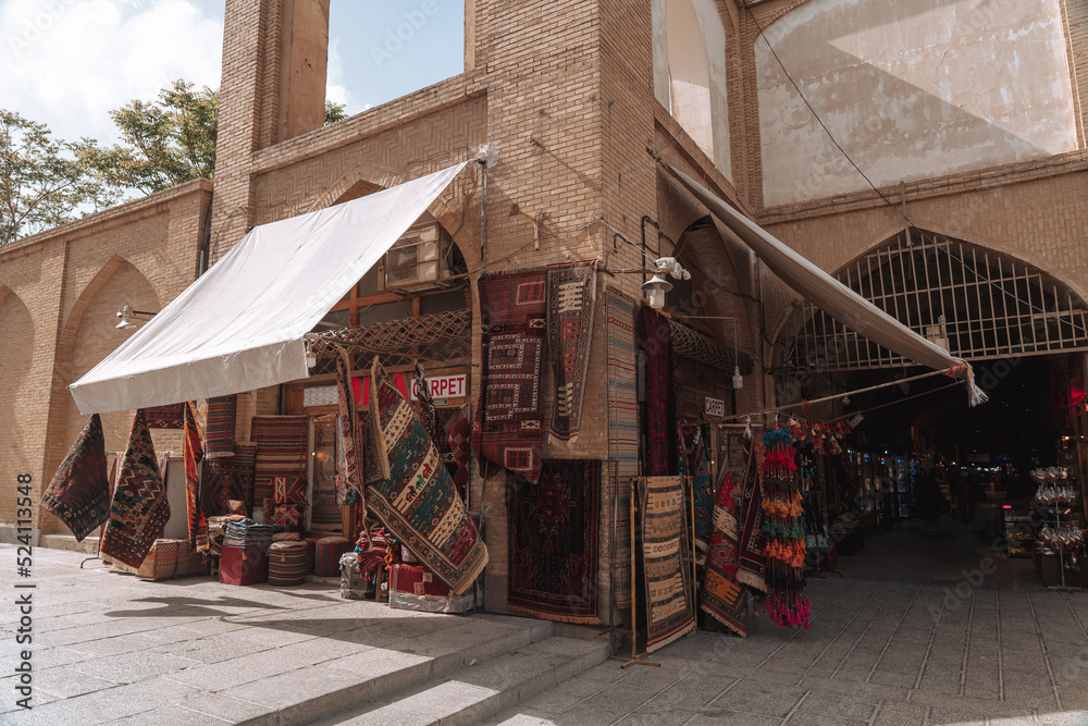 Local street market with handmade carpets in Iran Stock Photo | Adobe Stock