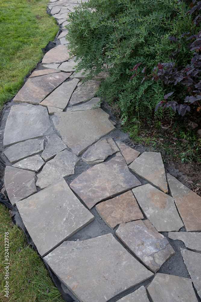 flagstone, sandstone landscaping in a country house, drainage systems ...