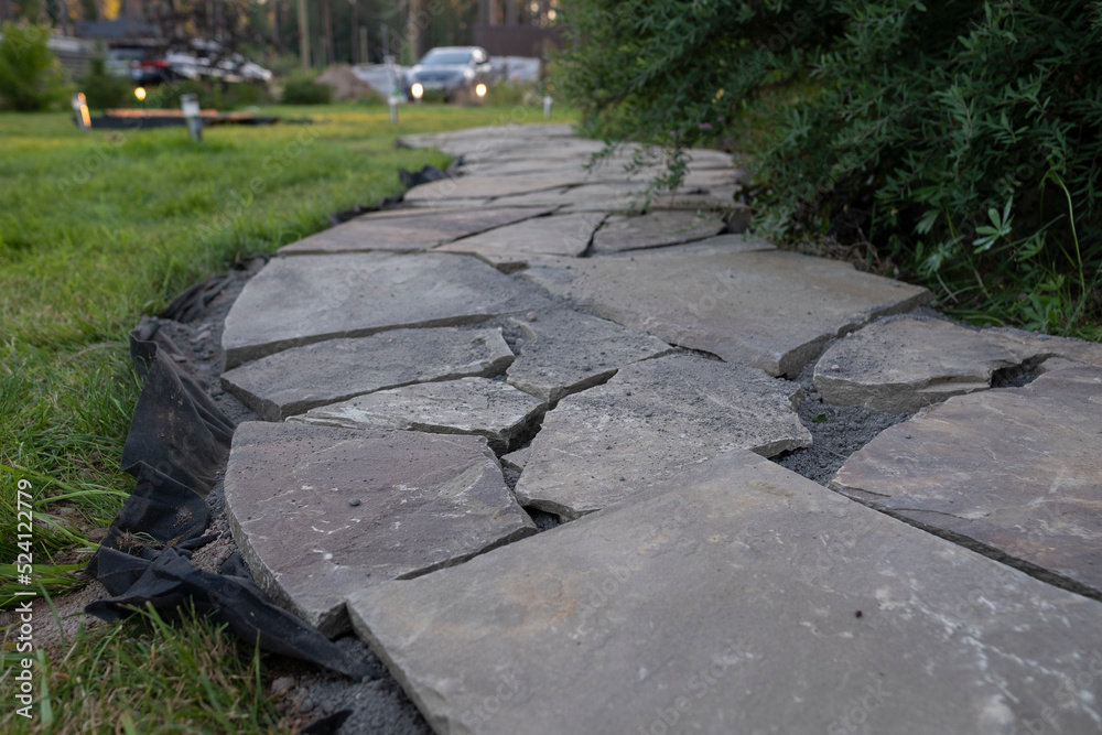 flagstone, sandstone landscaping in a country house, drainage systems ...