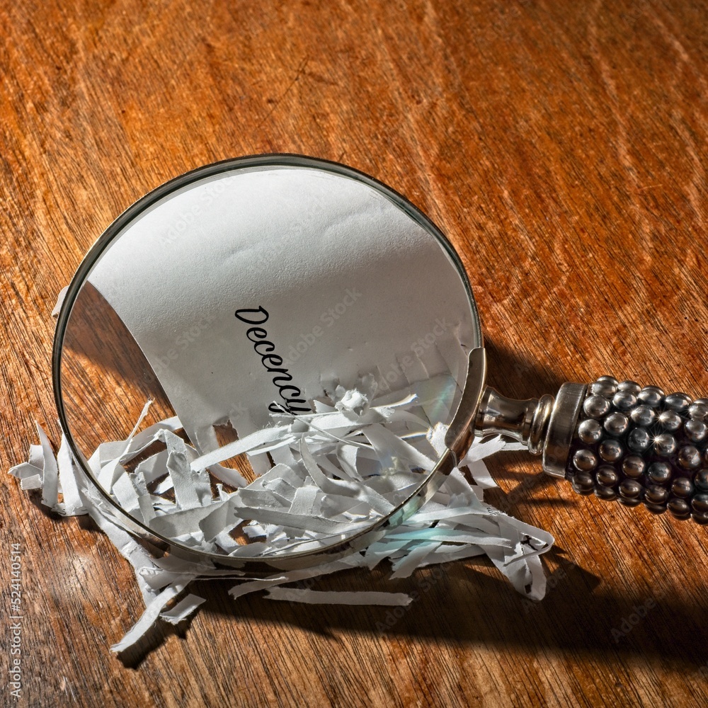 Shred of Decency concept divulging the word ‘Decency’ recovered from a ...