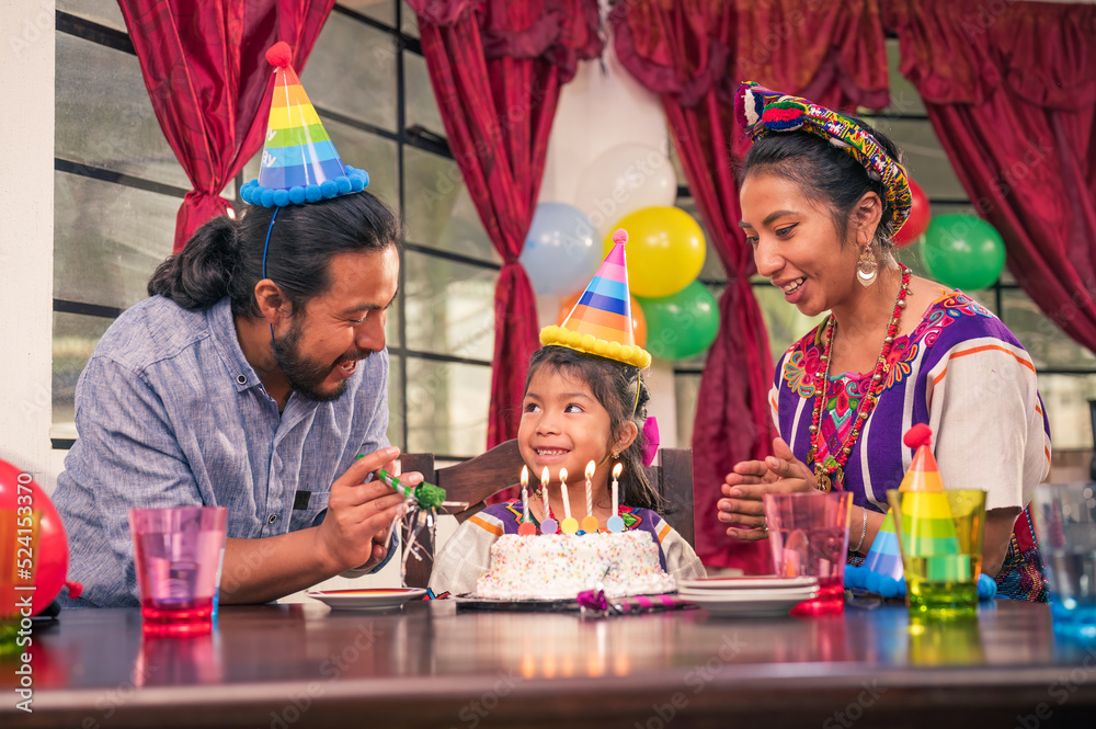 Hispanic family celebrates a birthday. Family at a birthday party ...