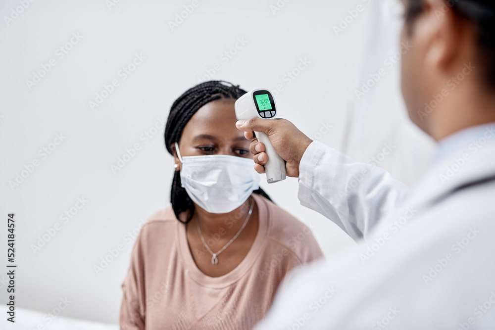Doctor Taking Temperature