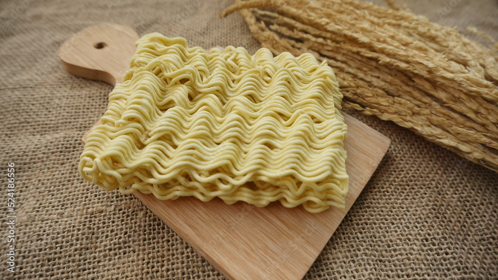 Crispy and dry instant square noodle. Uncook and unhealthy dried noodle ...