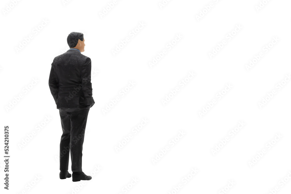 Miniature people businessman wearing black suit standing isolated on ...