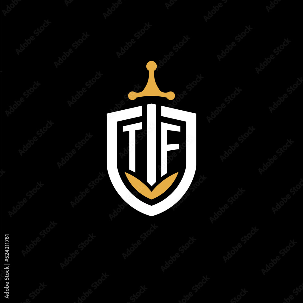 Creative letter TF logo gaming esport with shield and sword design ...