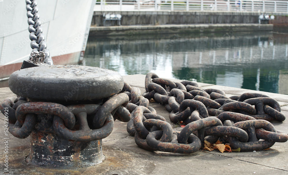 Chain of moorings for ships in the harbor Stock Photo | Adobe Stock