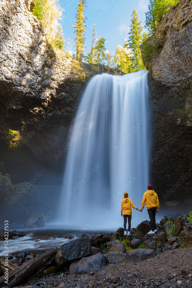 Beautiful waterfall in Canada, couple visit Helmcken Falls, the most ...