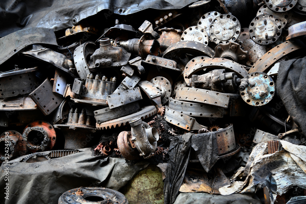 Pile of old machine parts and car spare parts. Rusty and corroded ...