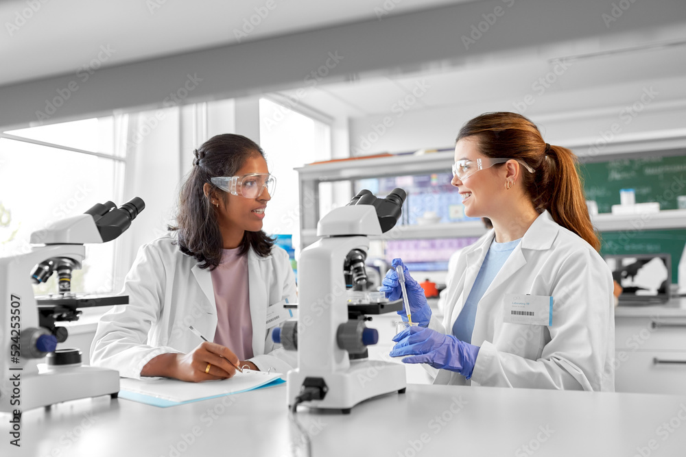 science research, work and people concept - happy international female ...