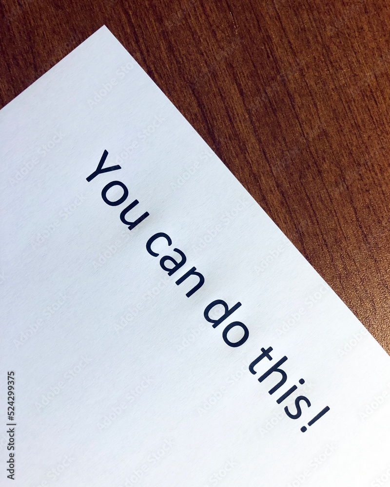 "You Can Do This" inspirational quote on paper sitting on a wood desk ...