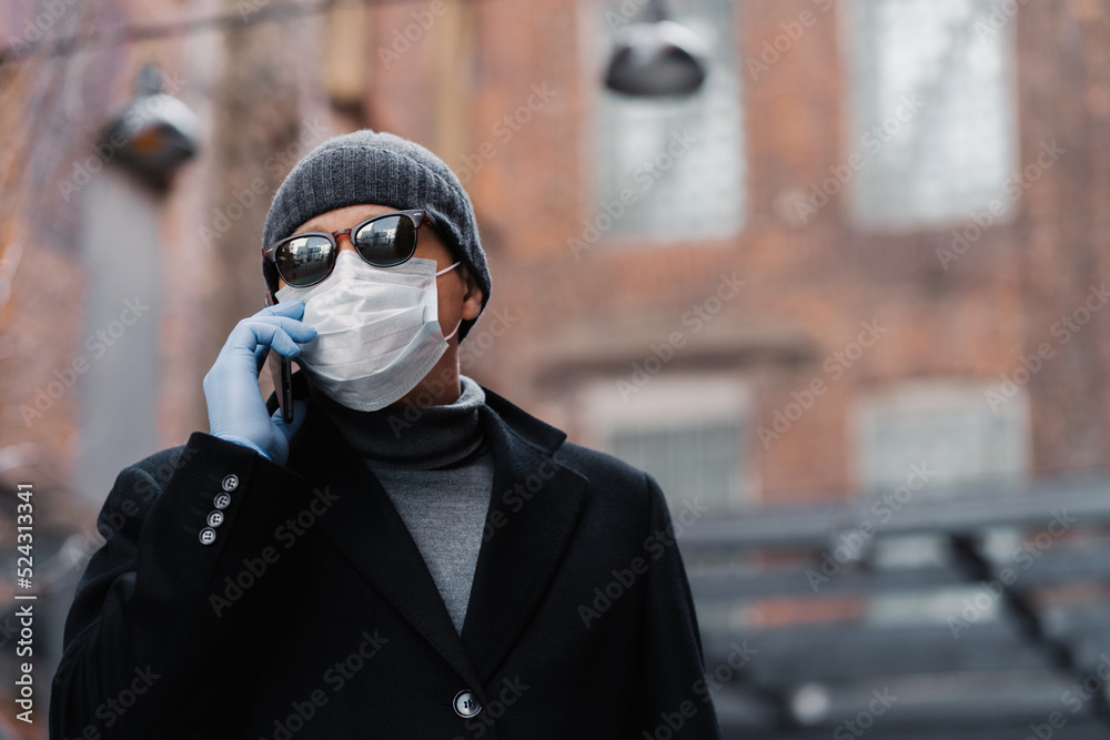Sick man wears protective mask on face during virus pandemic, has ...