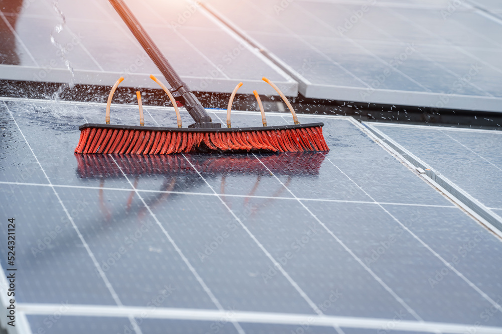 labor working on cleaning solar panel at solar power plant,Professional ...