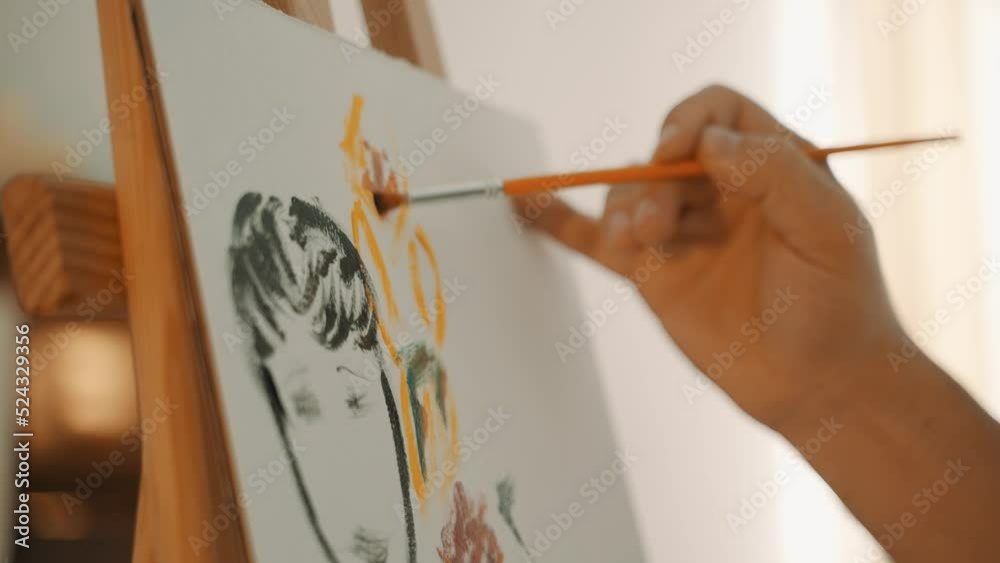 Drawing with two hands. Couple is drawing picture. Man and woman make ...