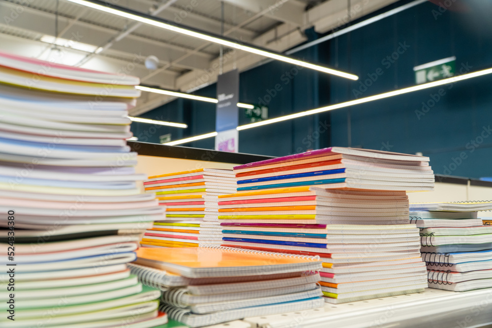 books and notebooks on supermarket for the back to school marketing ...