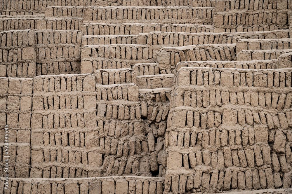 Detailed pattern of adobe clay bricks from the the pyramid section of the Huaca Pucllana ...