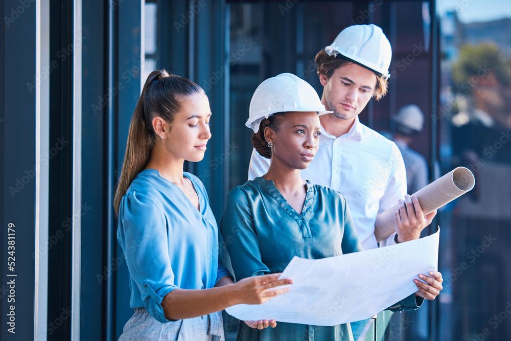 Engineer, architect or designer team looking at blueprint, design ...