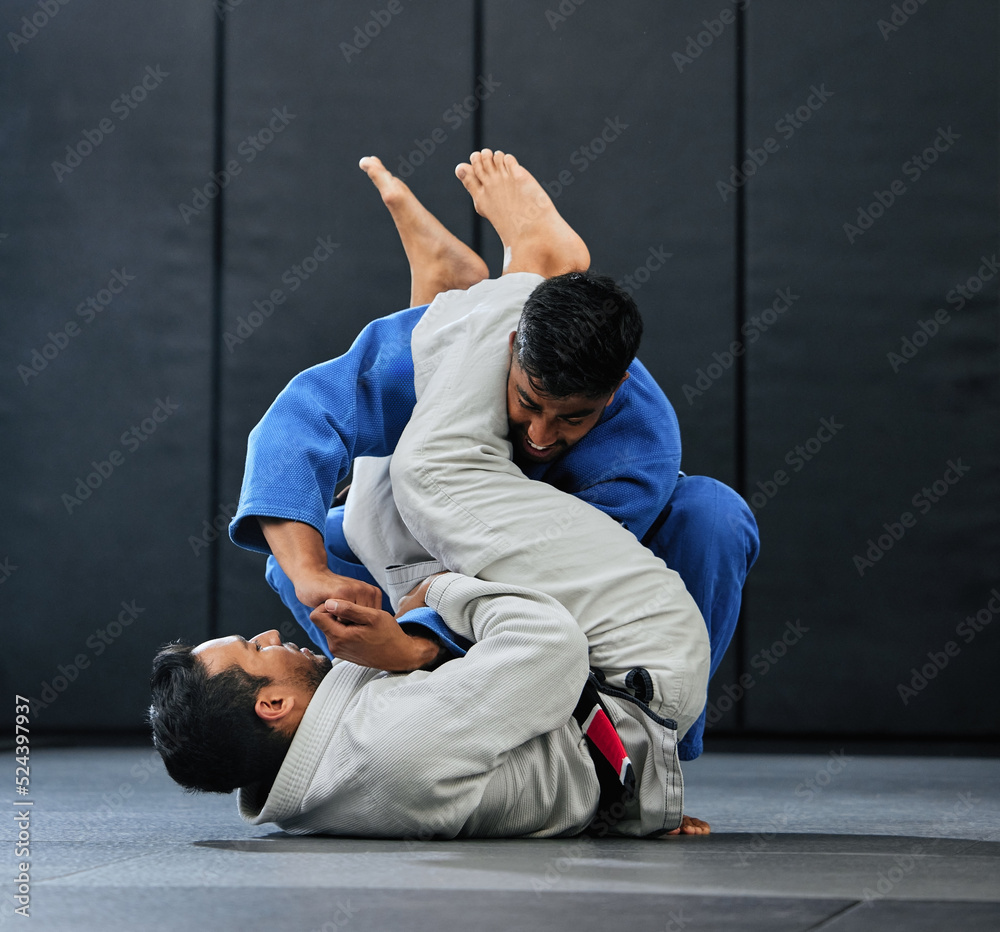 . Men fighting during karate training at fitness studio, doing fight ...