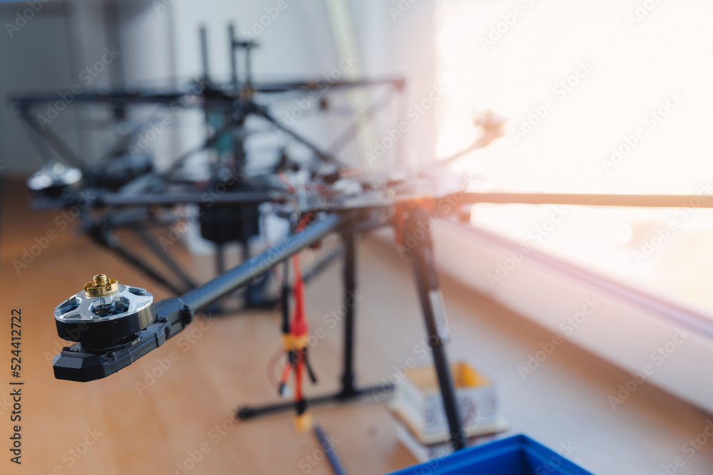 Professional workplace repair shop of toy RC models of cars robots ...