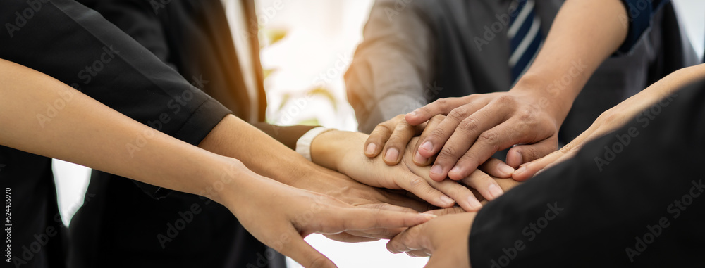 Businesspeople cooperate for create power of team in the office ...