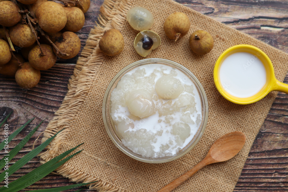 Sticky rice boiled in syrup with longan and coconut milk dressing at ...