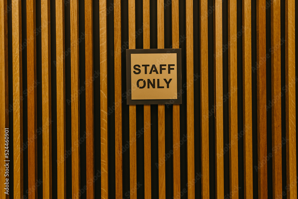 staff only text on a steel board on a door. Stock Photo | Adobe Stock staff only text on a steel board on a door. Stock Photo | Adobe Stock