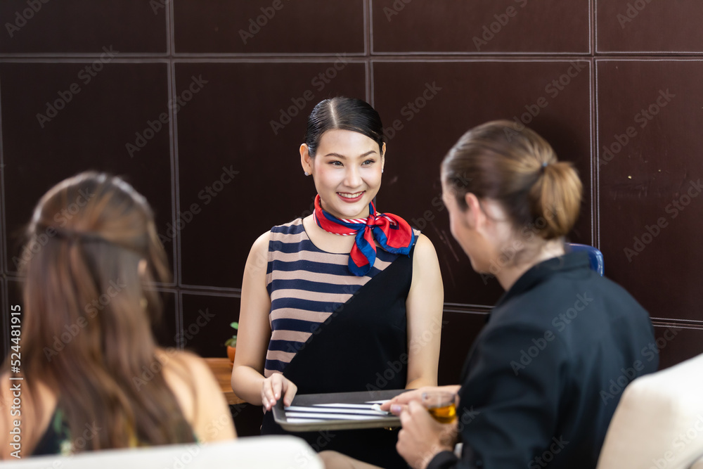 beautiful young asian woman receptionists working at a reception desk ...