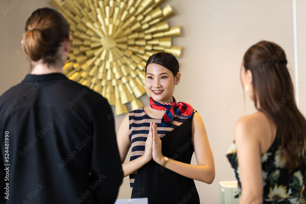 beautiful young asian woman receptionists working at a reception desk ...