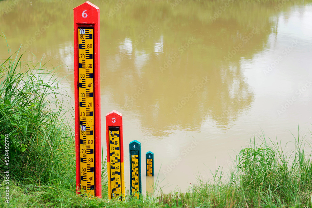 The water level pole was placed on the edge and the water was murky ...