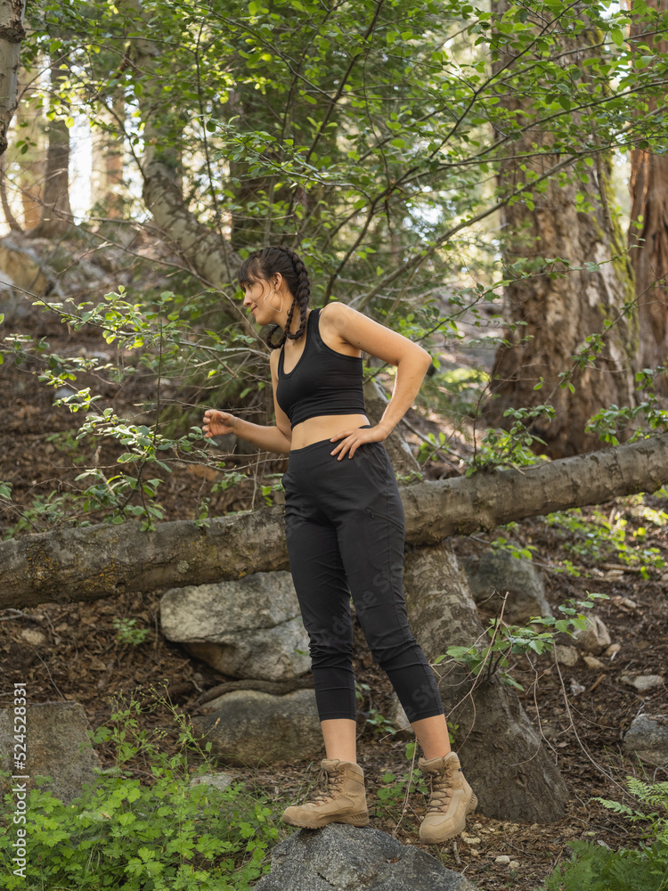 Indigenous young woman near a body of water Stock Photo | Adobe Stock